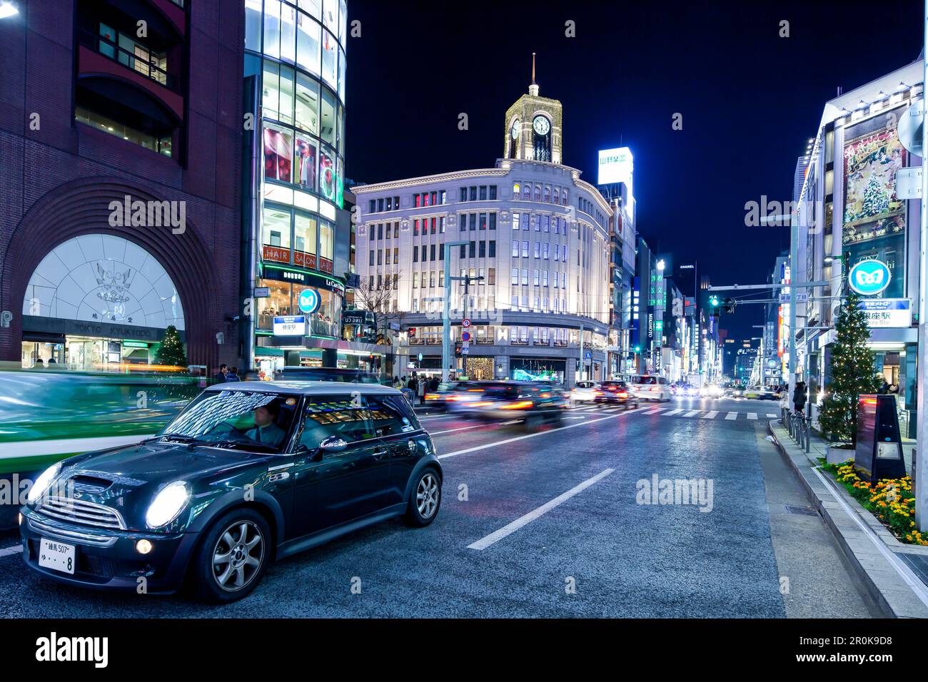 Crossing with cars at Wako Building in Ginza during blue hour, Chuo-ku ...