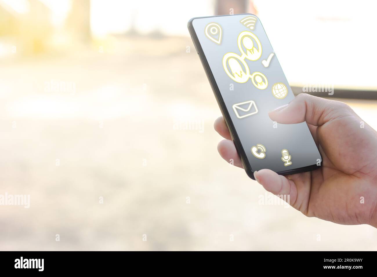 hand holding the smartphone touch the screen to connection people for ...