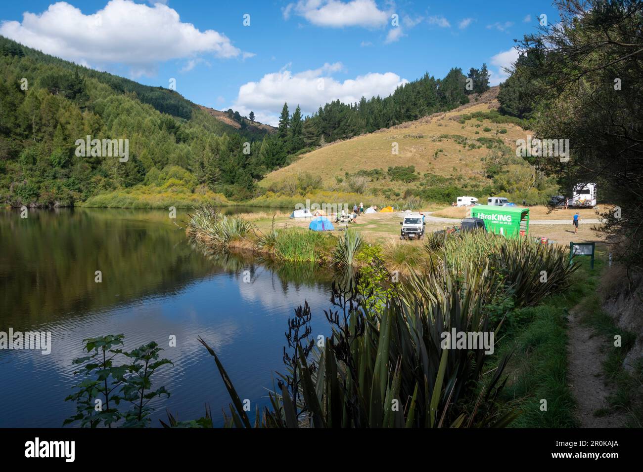 Lake at Gabriel's Gully camp site, near Lawrence, Otago, South Island ...