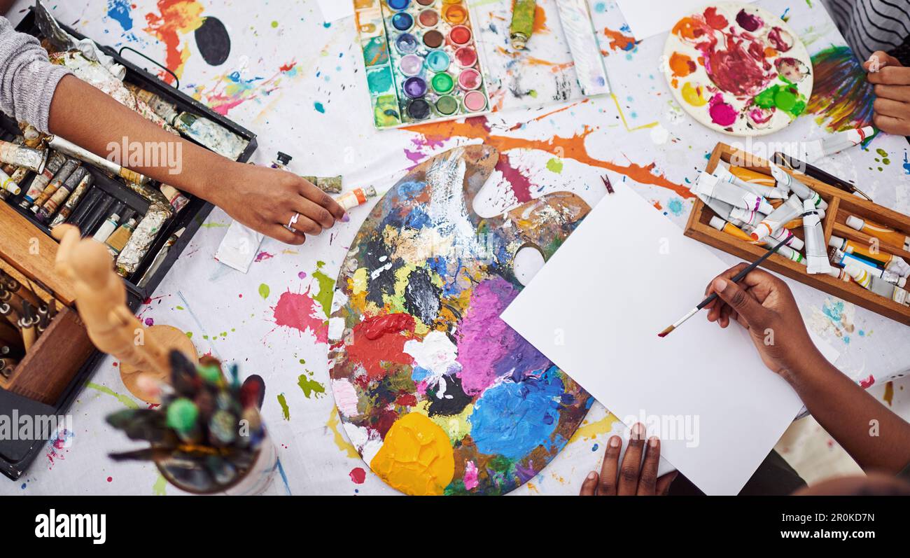 Pick a color and start creating. a group of people attending a art ...