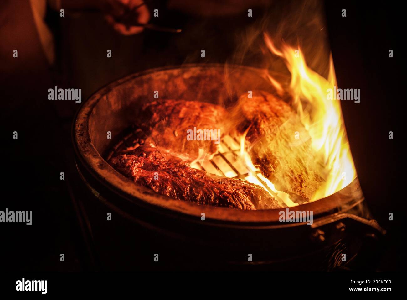 fire flame grilled beef in smoker, cooking course at Swabian Alb, Baden ...