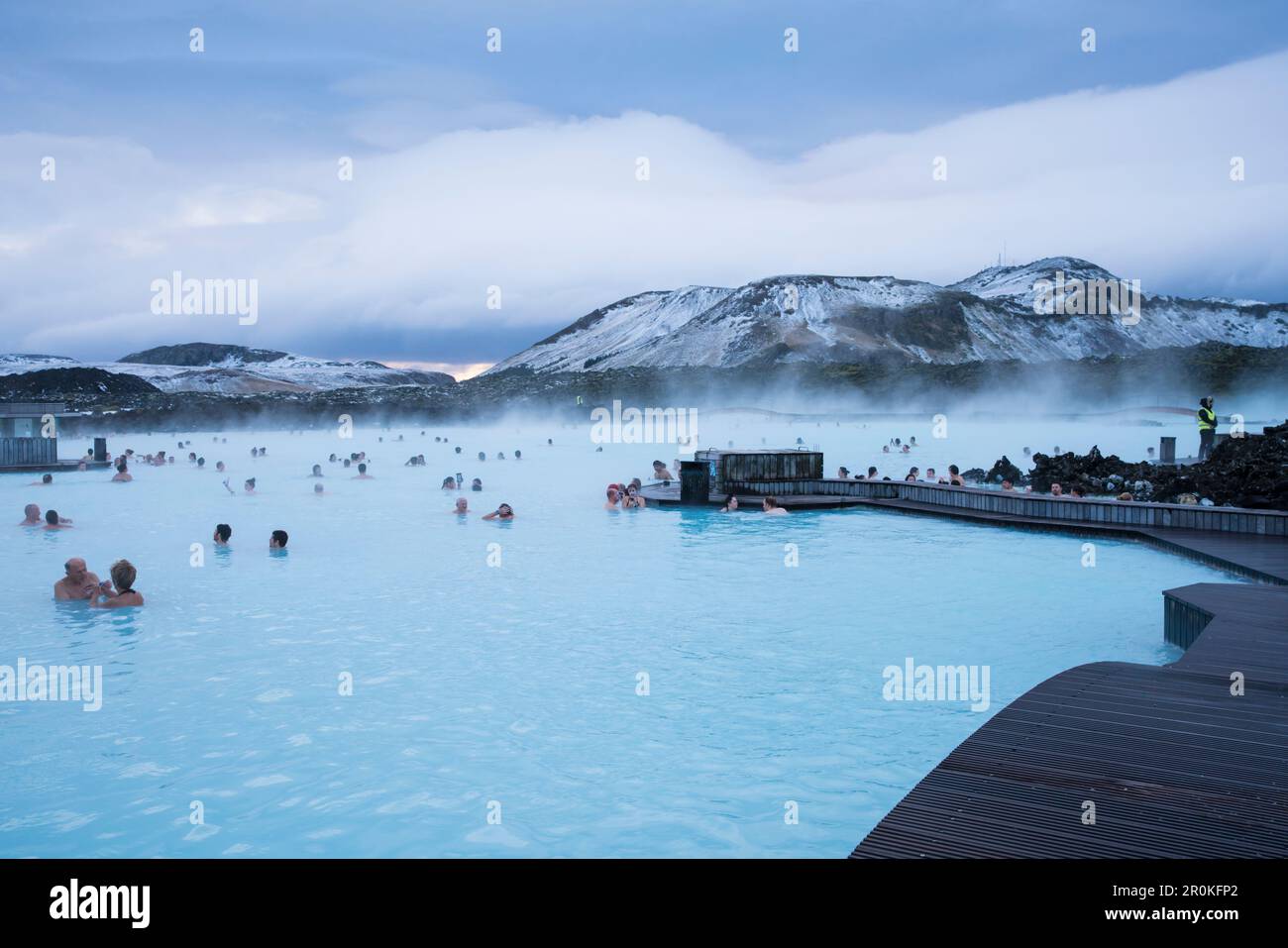 People bathe and swim at The Blue Lagoon, the famous wellness thermal ...