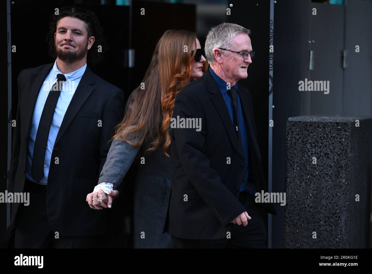 William Fleming, (right), the father of Simon Fleming, leaves the NSW ...