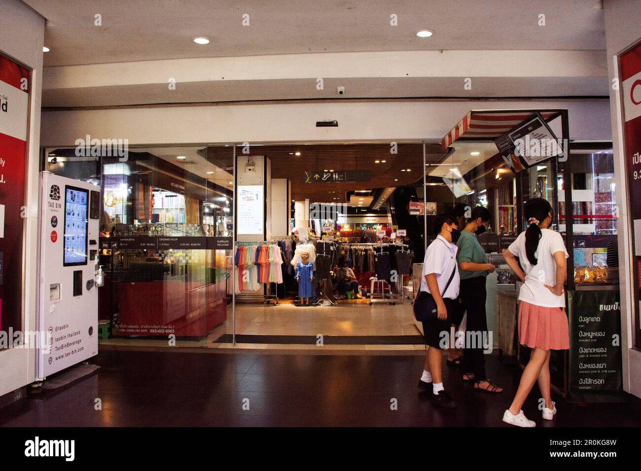 Thai people customers and foreign travelers travel visit and select shopping buy goods products ...