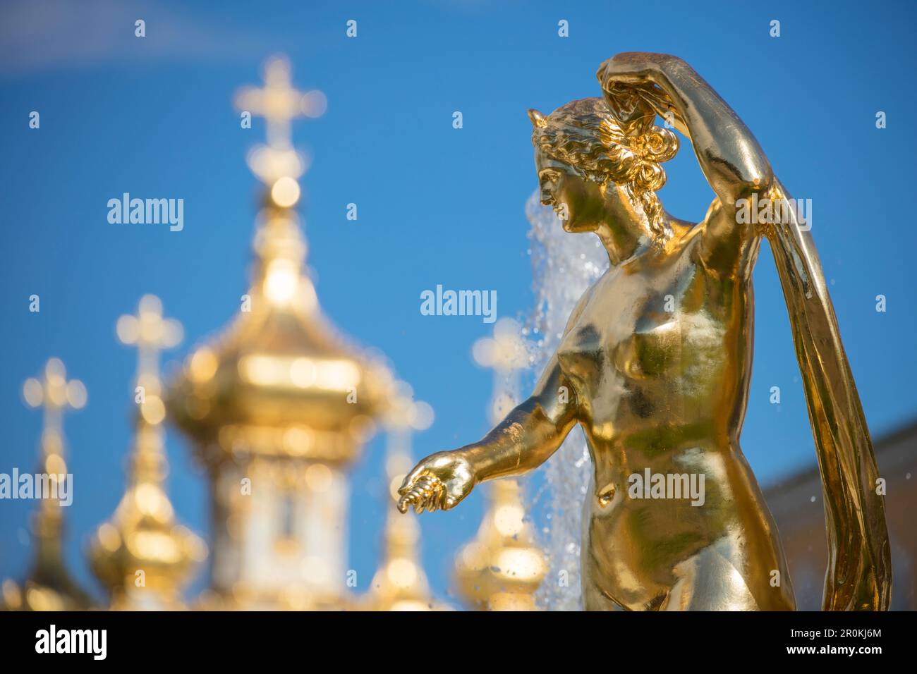 Detail of golden statue at Grand Cascade fountains at Peterhof Palace ...