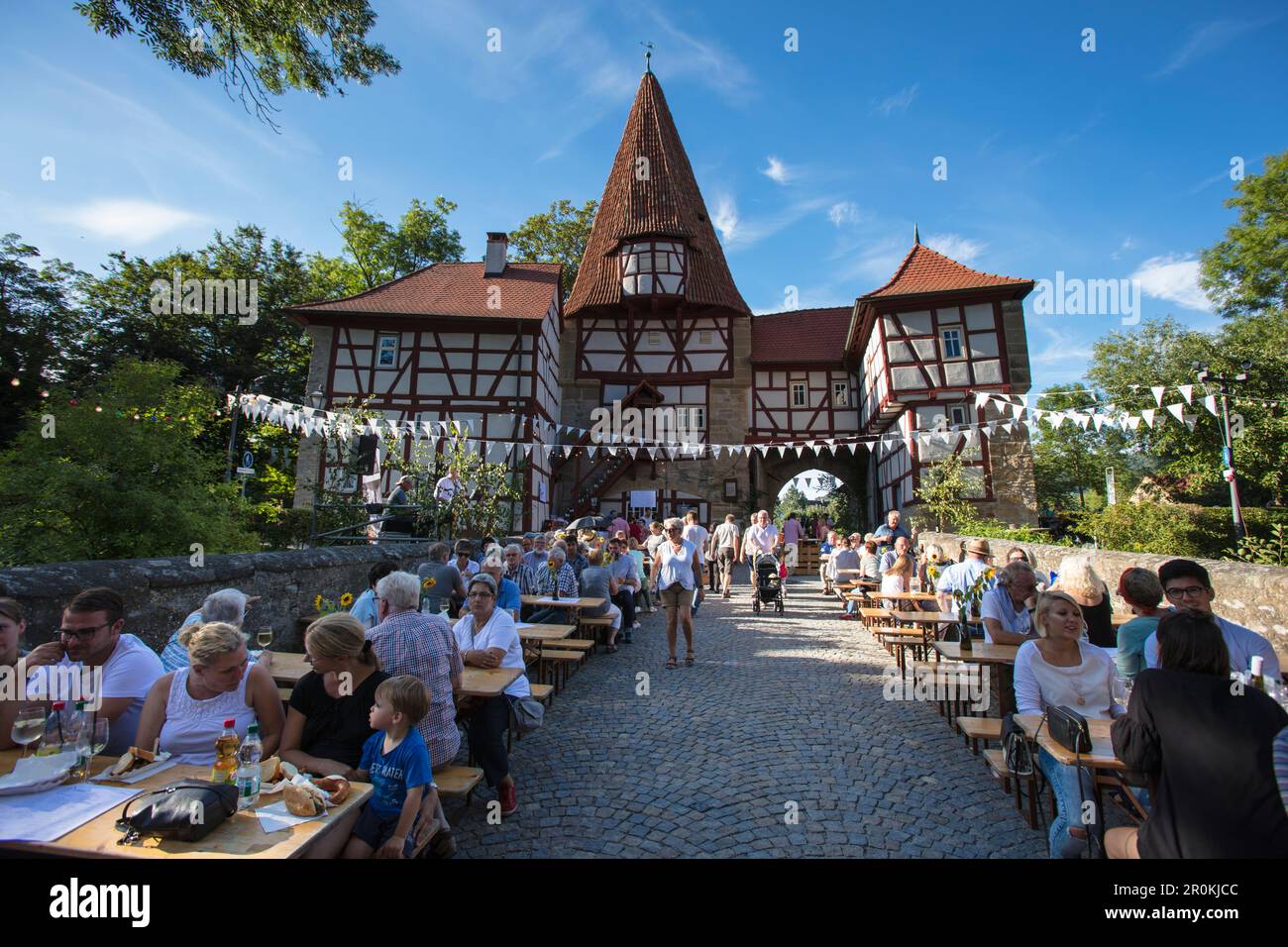 People enjoy Frankenwein Franconian wine at Weinfest am Rödelseer Tor ...