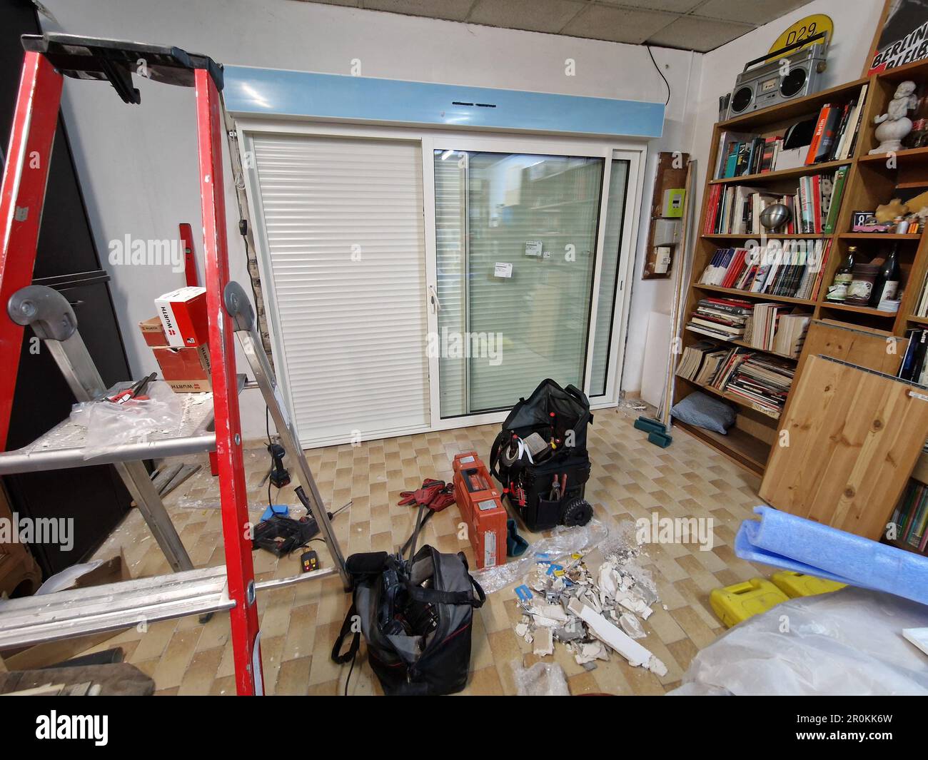 Interior fittings, craftmen setting up a glass window, Bron, France ...