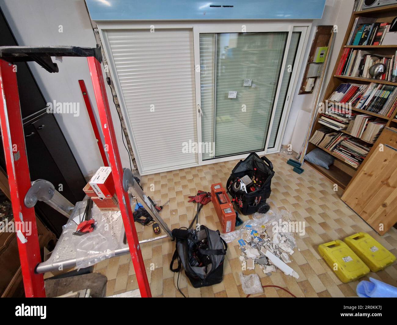 Interior fittings, craftmen setting up a glass window, Bron, France ...