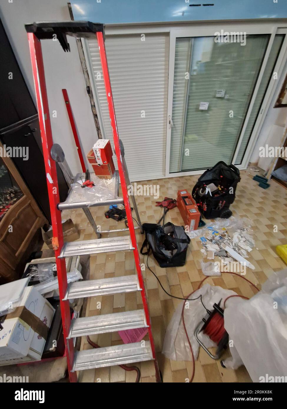 Interior fittings, craftmen setting up a glass window, Bron, France ...