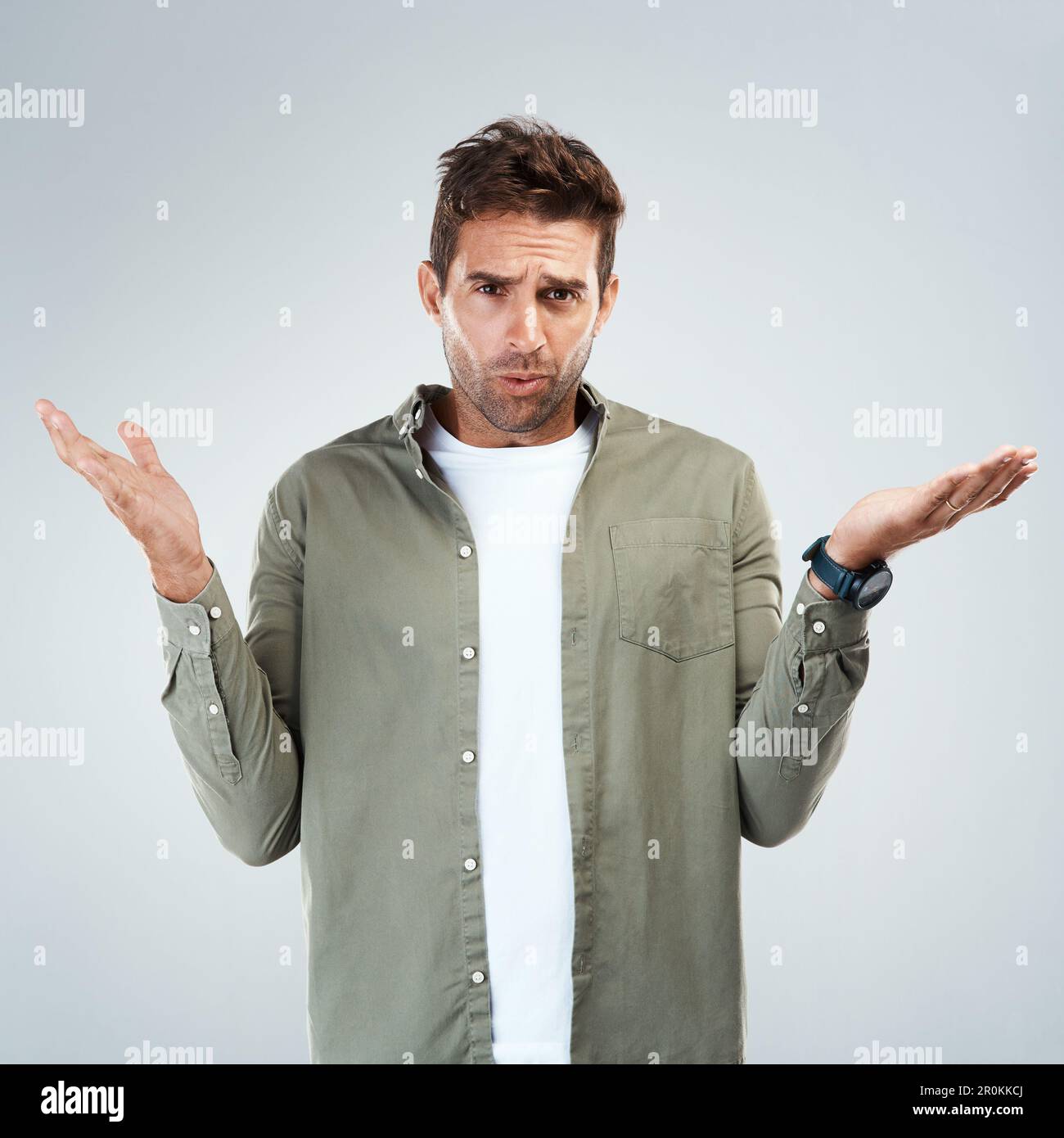 What do you mean. Portrait of a surprised facial expression standing ...