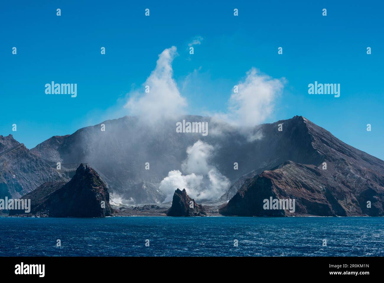 Steam rises from the craggy landscape of New Zealands only volcanic ...