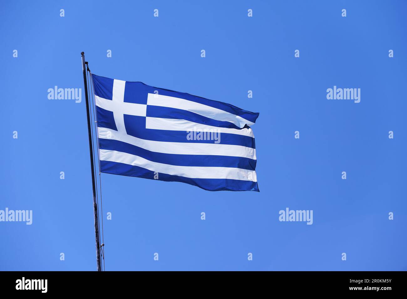 Greek flag waving on pole hi-res stock photography and images - Alamy