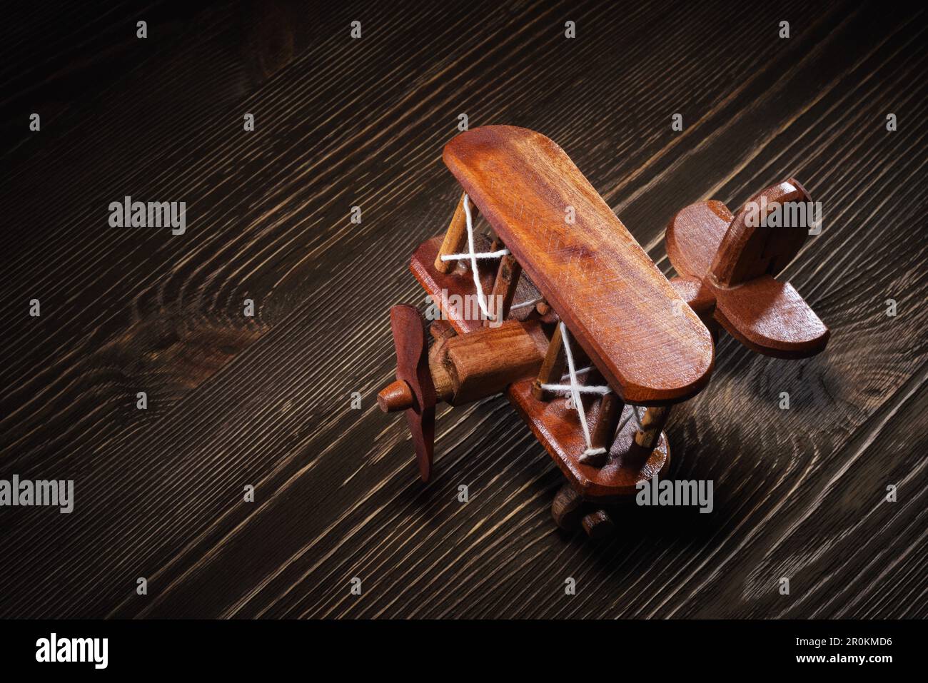 Wood toy plane hand made model on rustic wooden table Stock Photo - Alamy