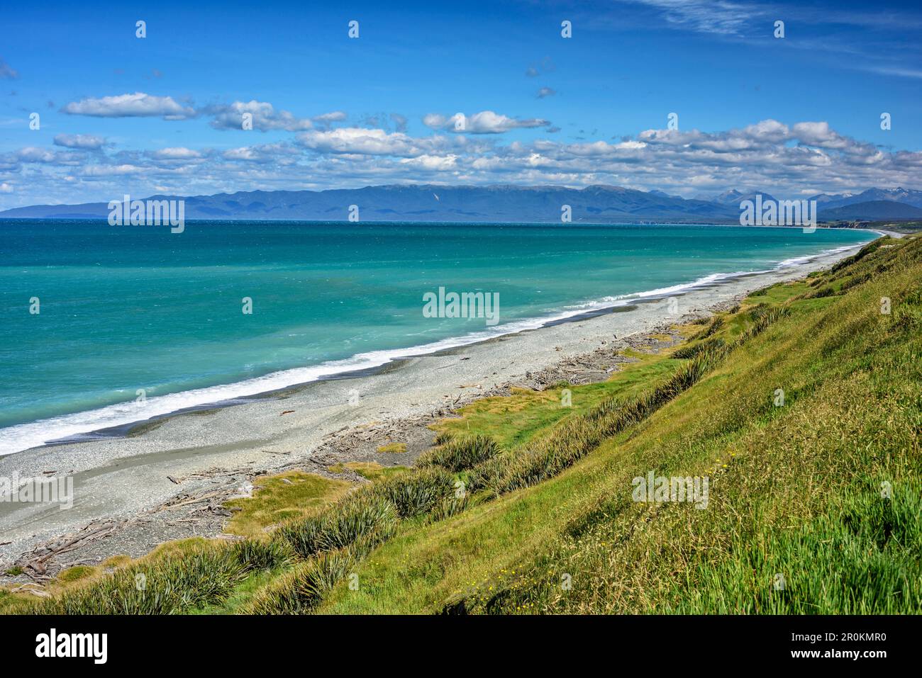 Beach at Tasman Sea, Hump Ridge in background, Fiordlands National Park ...