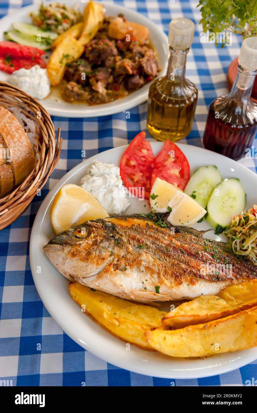 Greek food, Grilled fish with salad, main course, Plakias, Crete ...