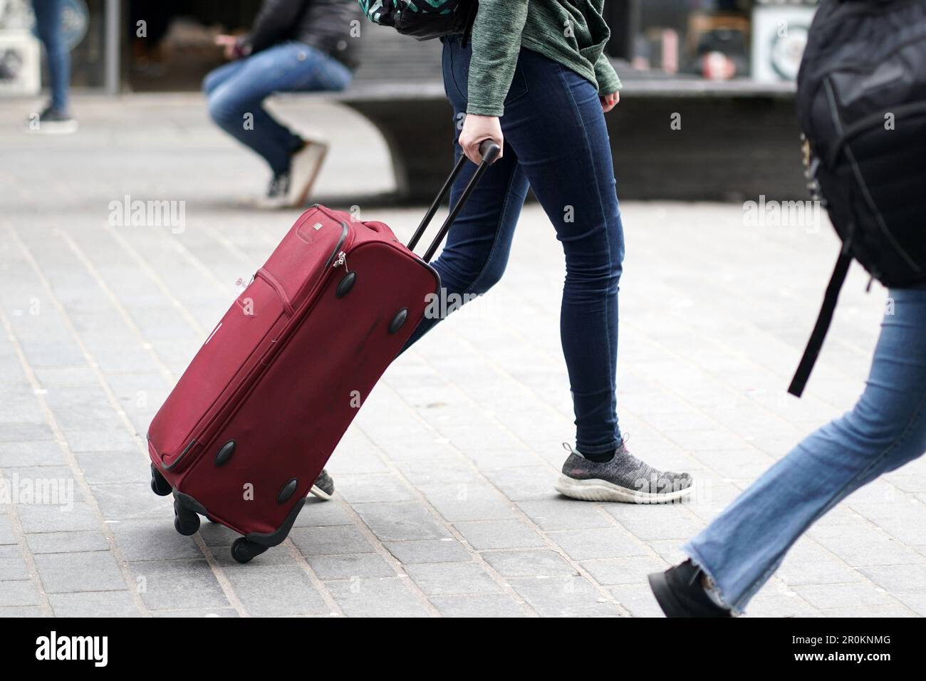 Wheelie suitcase pavement hi-res stock photography and images - Alamy