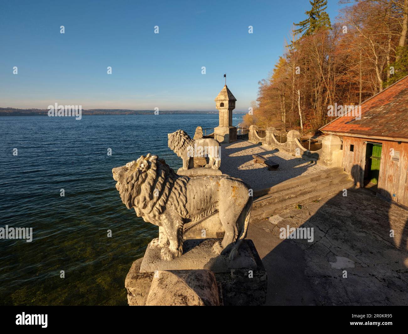 The two lions and the tower of the bathing area of Schloss Seeburg at ...