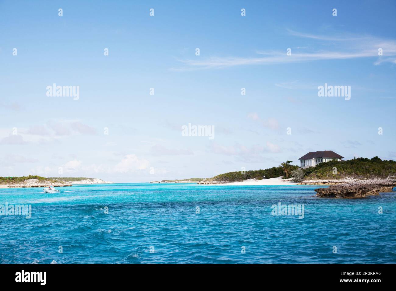 EXUMA, Bahamas. A view of the water and a house at Musha Cay Stock ...