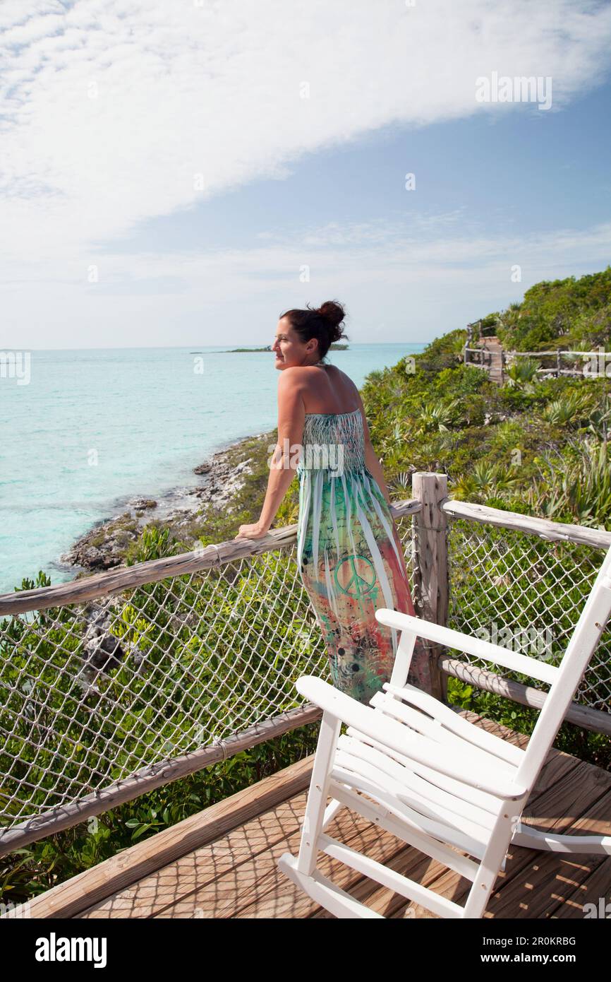 EXUMA, Bahamas. Nicole on a balcony of one of the villas at the Fowl ...