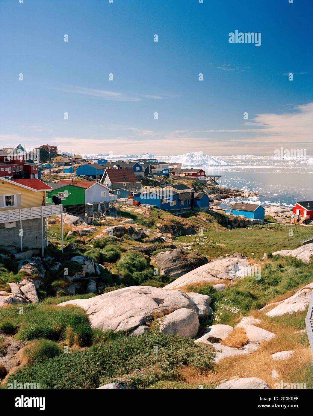 GREENLAND, Ilulissat, Disco Bay, exterior of houses with lake Stock ...