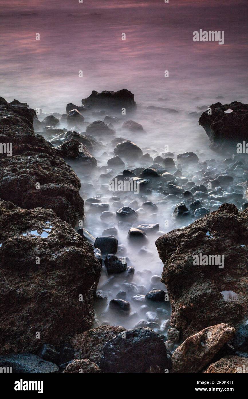 HAWAII, Oahu, North Shore, Big Swell rolling in at sunset at Pupukea ...