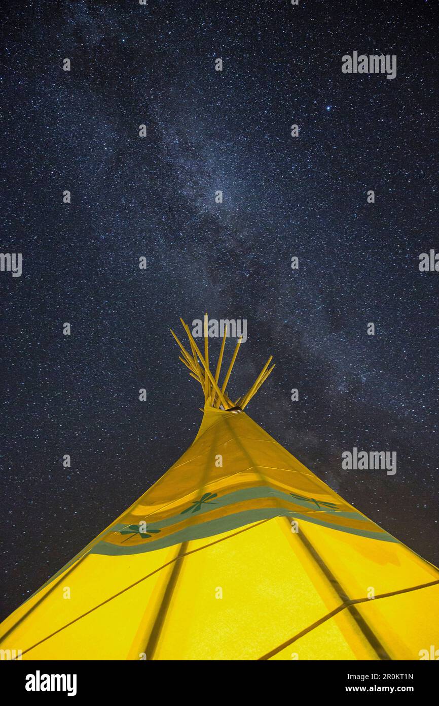 USA, Nevada, Wells, a view of the tipis and star covered sky at Mustang ...