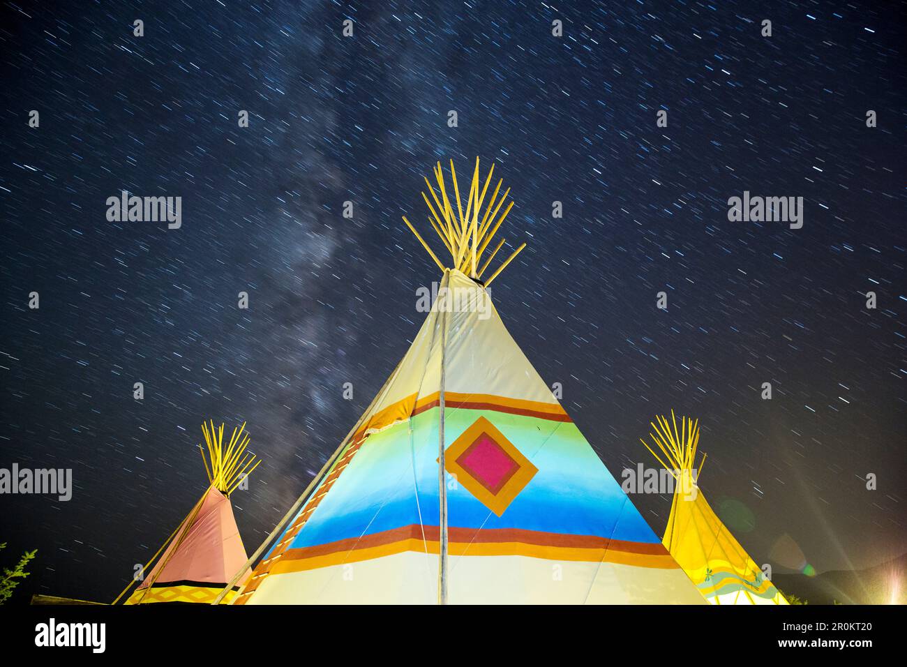 USA, Nevada, Wells, a view of the tipis and star covered sky at Mustang ...