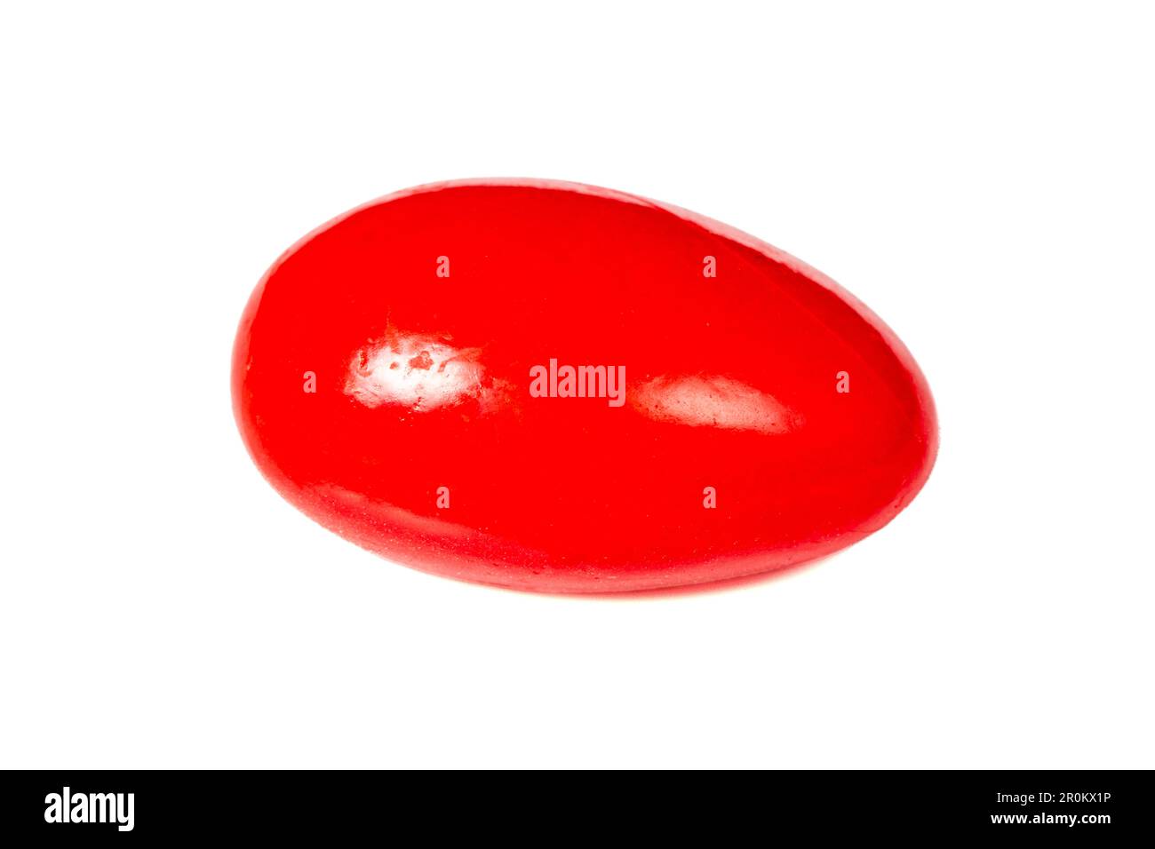 Almond Candies. Chocolate covered red dragee candy isolated on white ...