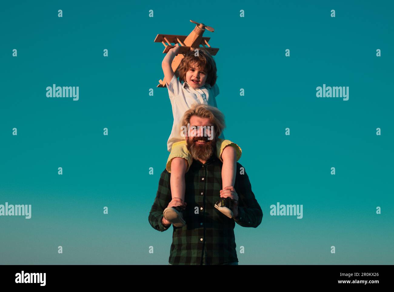 Child son pilot and dad daddy father with airplane. Happy boy Stock ...