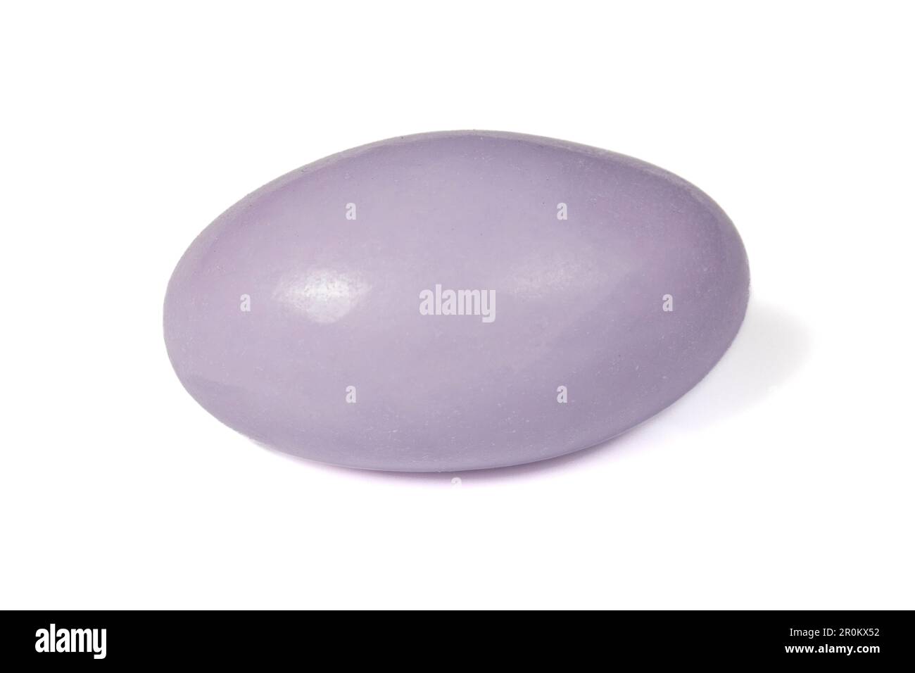 Almond Candies. Chocolate covered gray dragee candy isolated on white ...