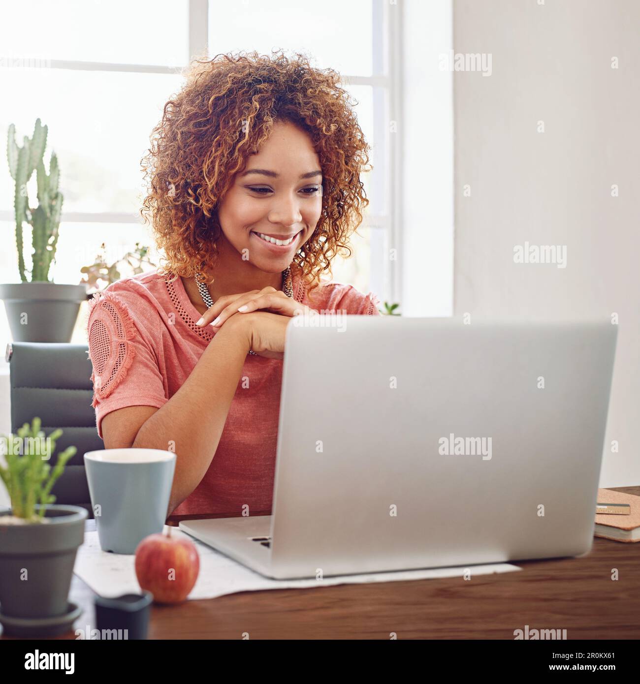 Happy woman, business student and laptop for planning at desk ...