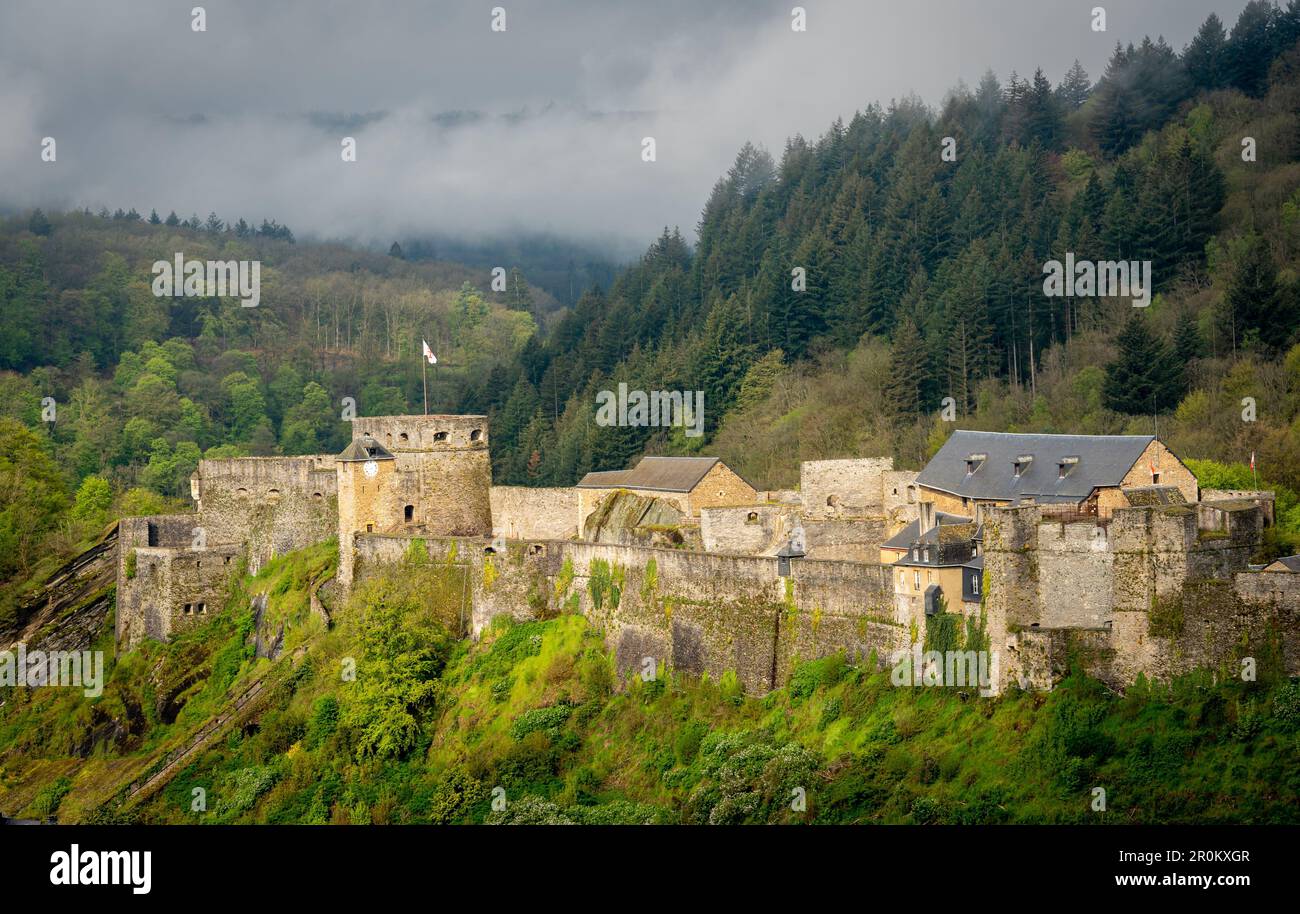 Bouillon Castle and the forests of the Ardennes in Belgium on a misty ...