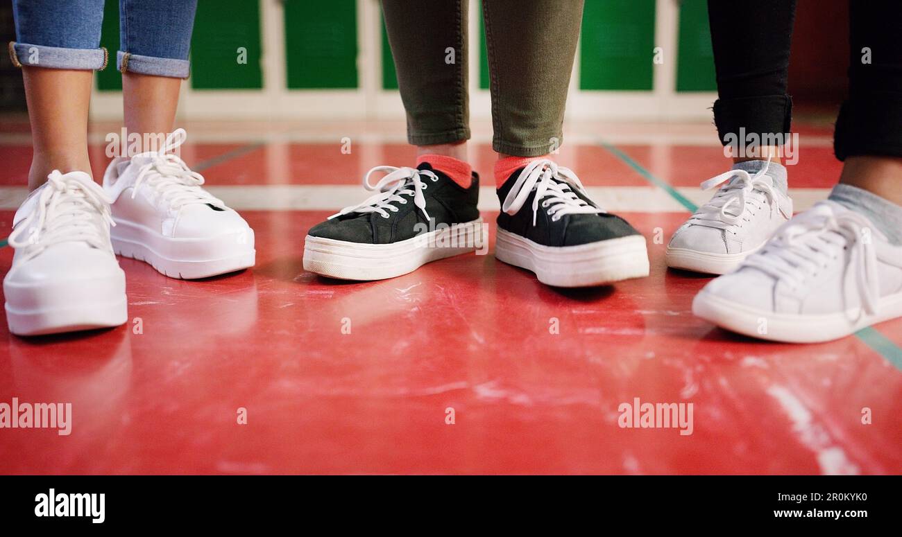 I am the the odd one out. Low angle shot of a group of unrecognizable ...
