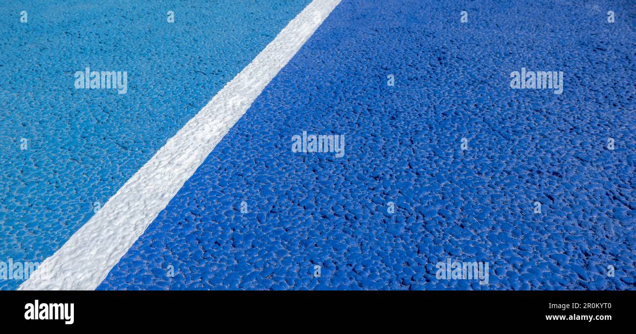 Sport field court background. Blue rubberized and granulated ground ...