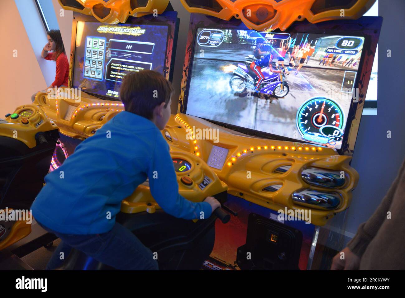 young boy playing video game on big screen Stock Photo - Alamy