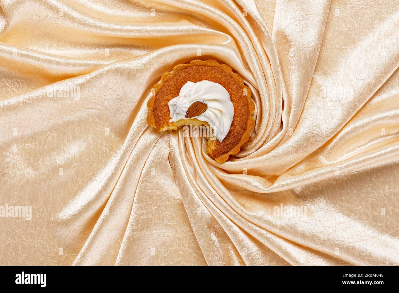 Creamy cheesecake cake on beige silk background Stock Photo - Alamy