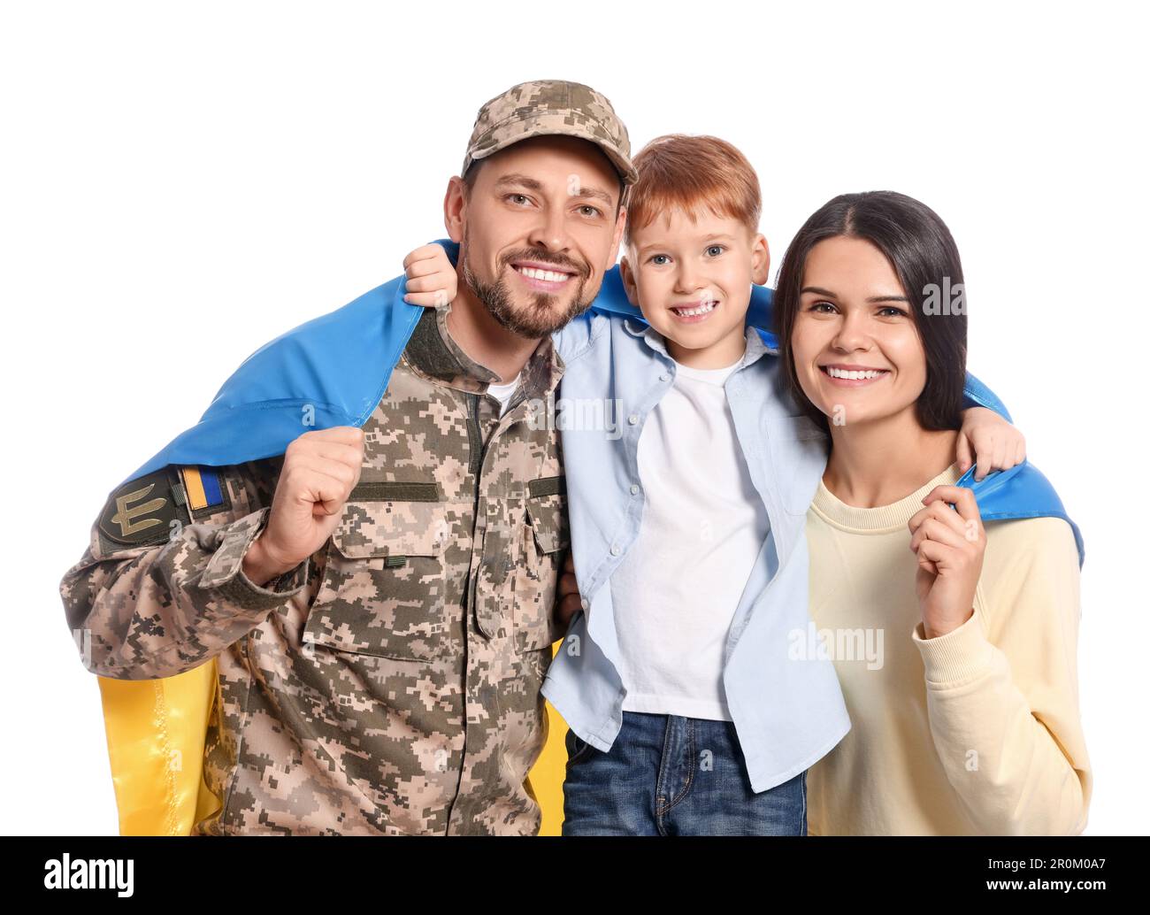 Ukrainian defender in military uniform and his family with flag on ...