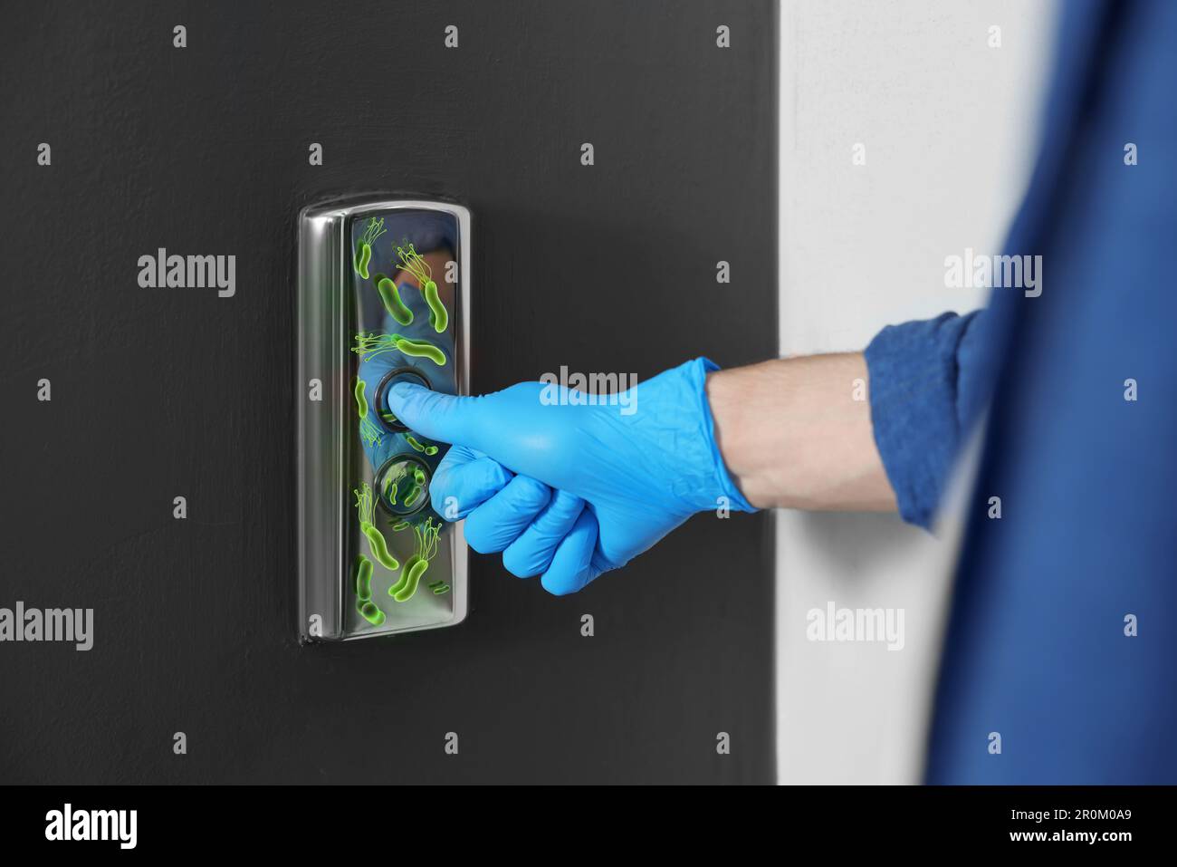 Man in glove press button in elevator with germs, closeup Stock Photo ...