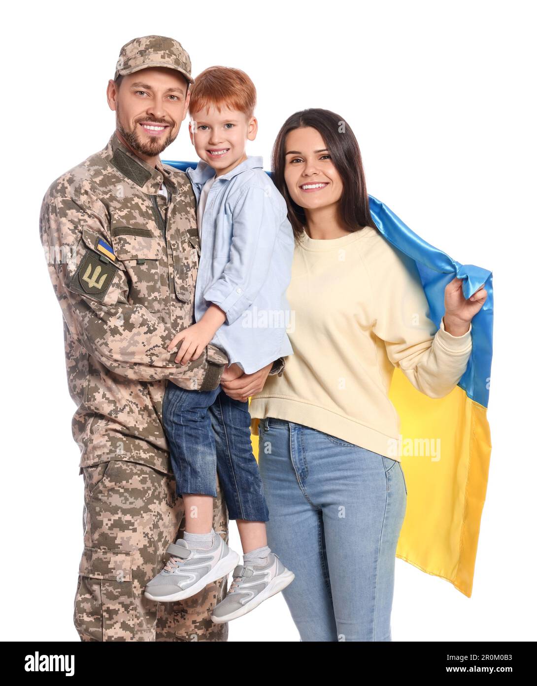 Ukrainian defender in military uniform and his family with flag on ...