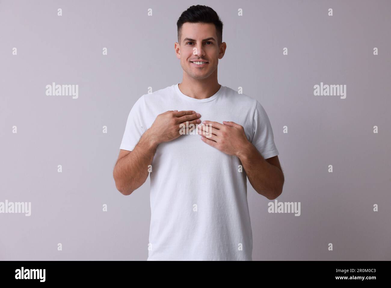 Hands holding chest hi-res stock photography and images - Alamy