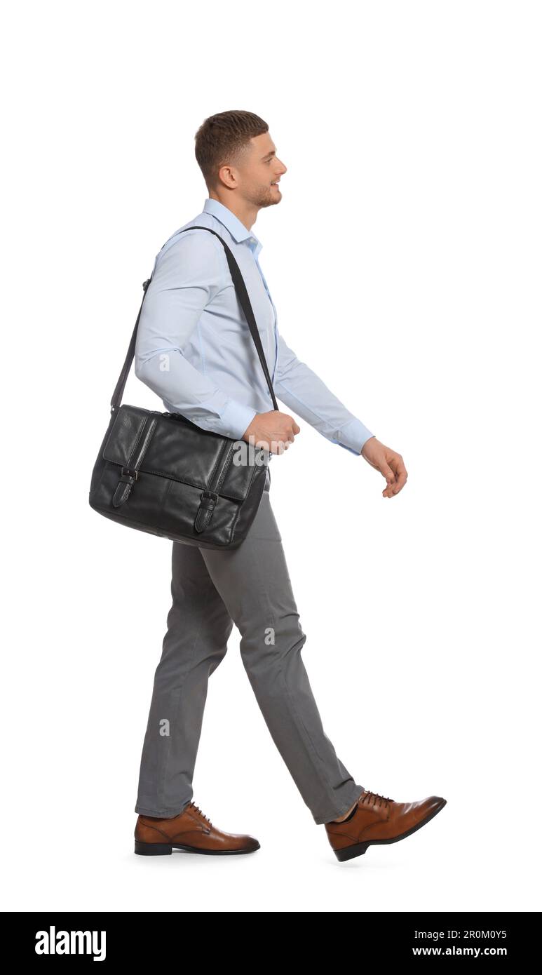 Man walking with bag Cut Out Stock Images & Pictures - Alamy