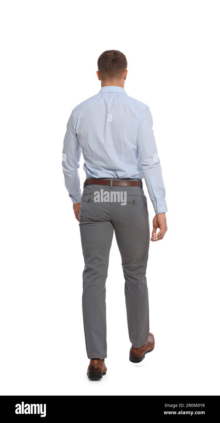 Man in formal outfit walking on white background, back view Stock Photo ...