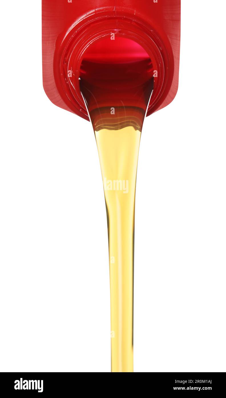 Pouring motor oil from red container isolated on white Stock Photo - Alamy