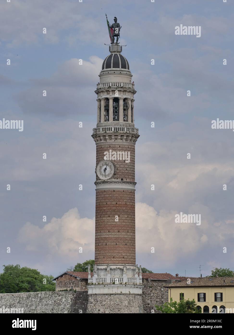 Bronze statue on san Fedele clock tower the tallest circular bell tower ...