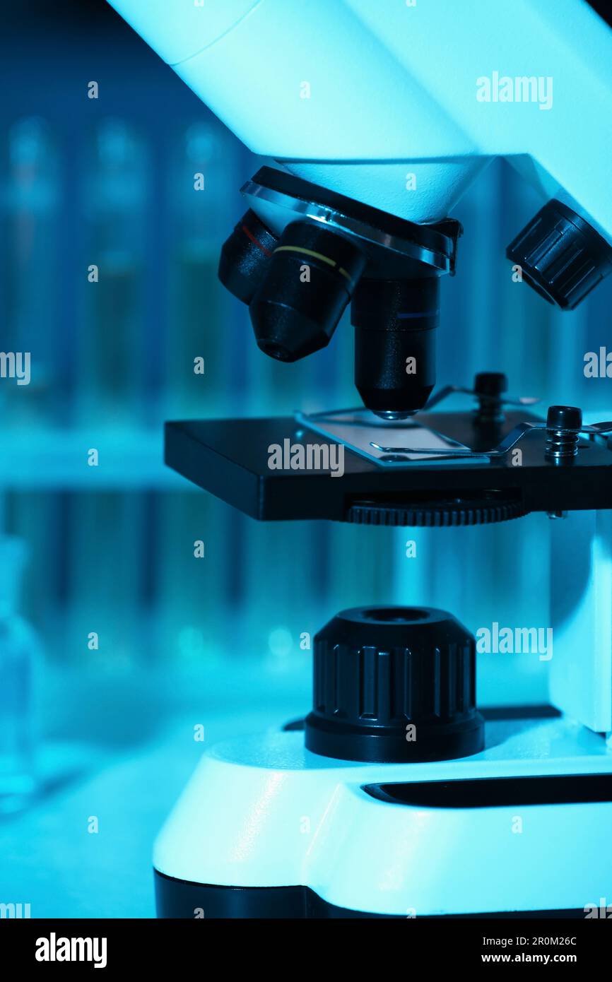 Modern medical microscope with glass slide in laboratory, closeup Stock ...