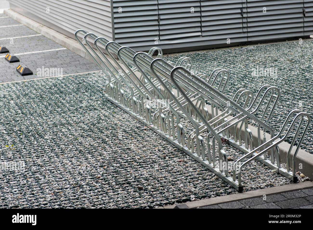 Empty metal parking rack for bicycles outdoors Stock Photo - Alamy