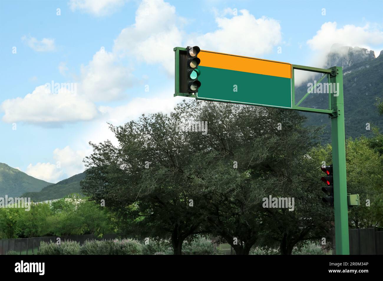 Traffic light and road sign outdoors on sunny day Stock Photo - Alamy