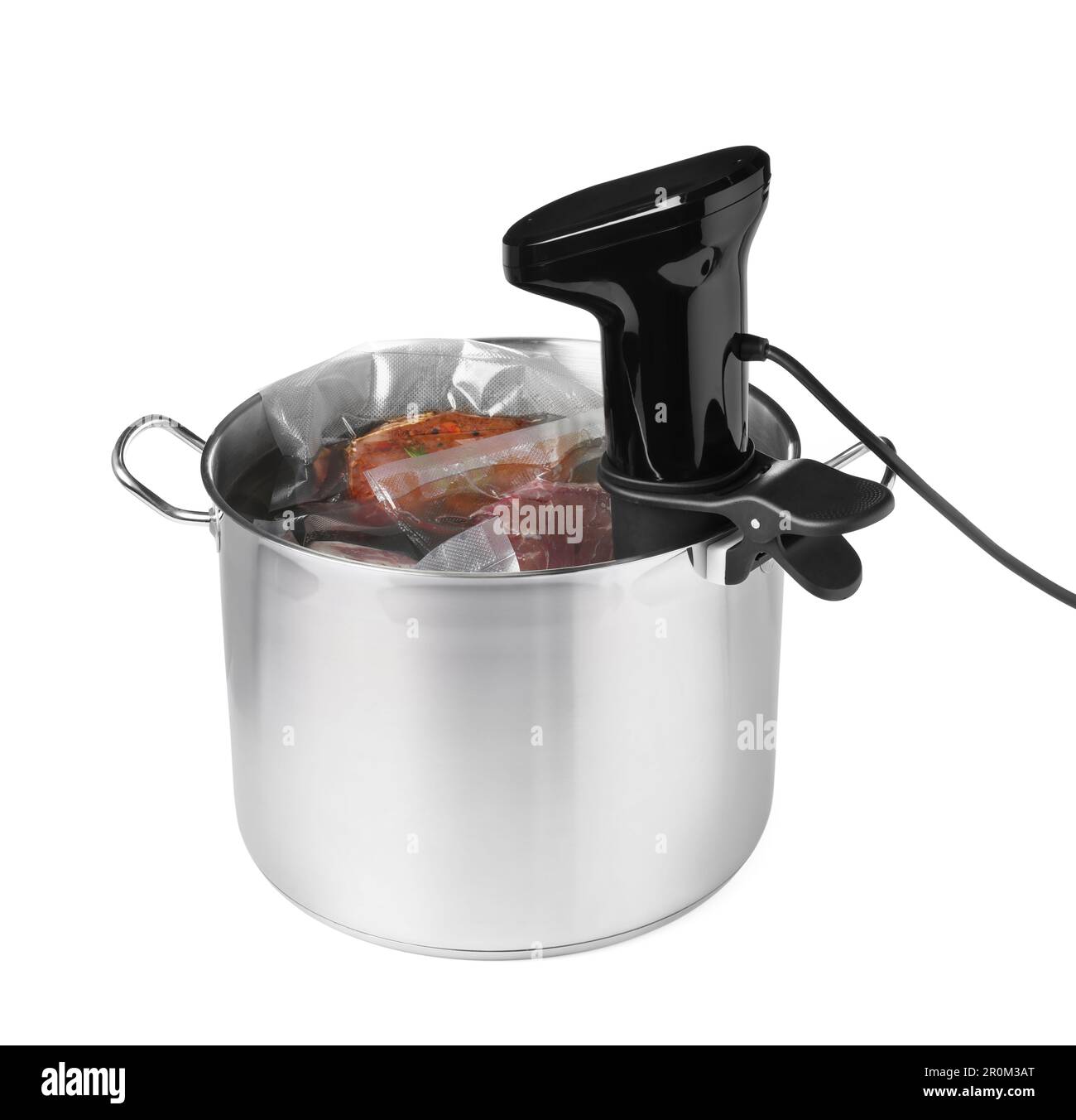 Thermal immersion circulator and meat in pot on white background ...