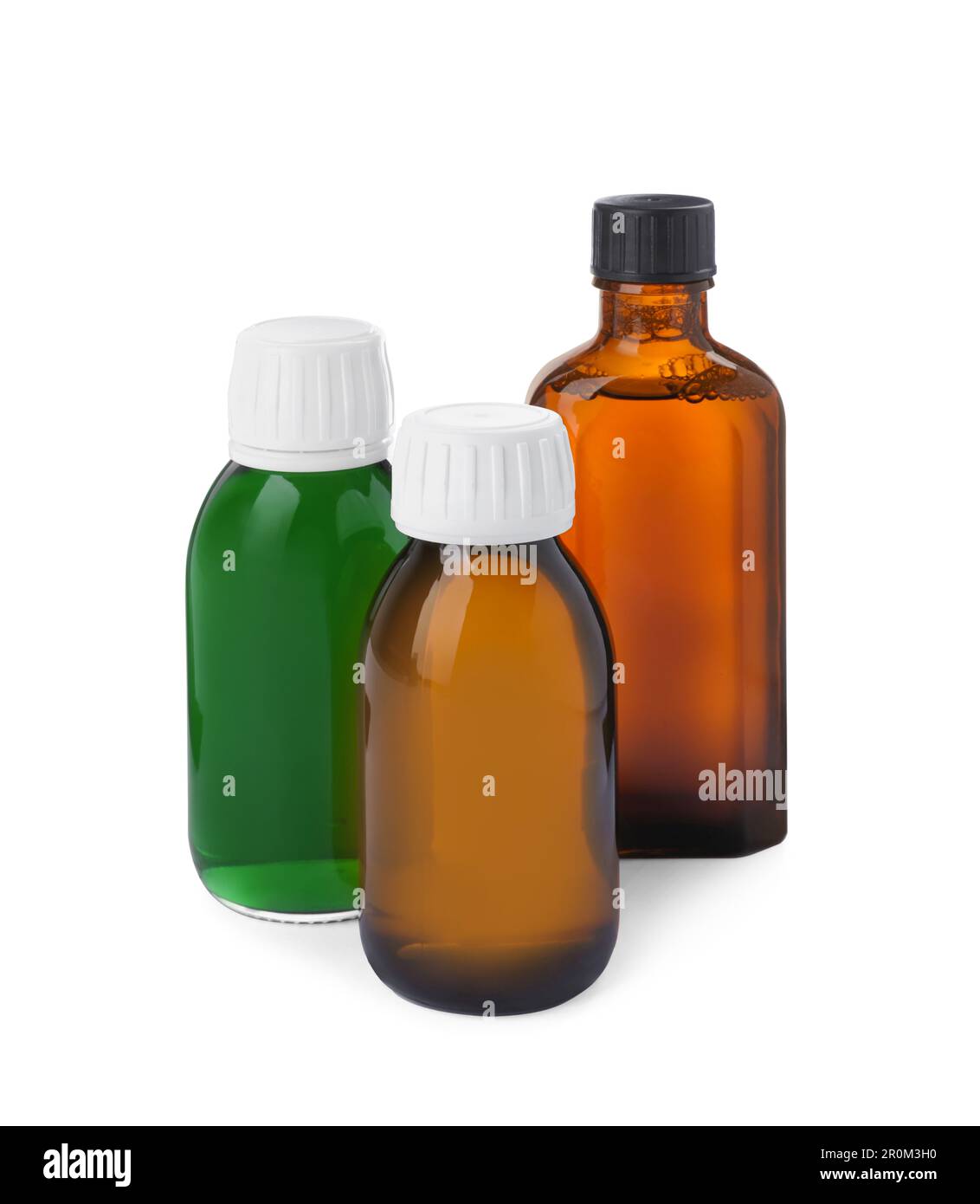 Bottles of syrups on white background. Cough and cold medicine Stock ...
