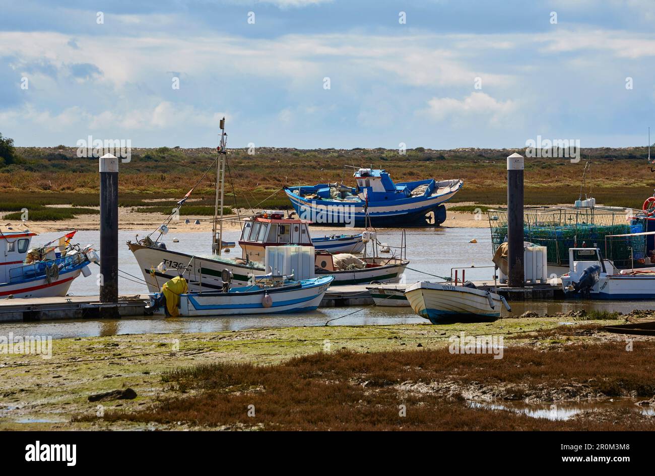 Fishing boats at the nature reserve Ría Formosa, Conceicao Cabanas ...